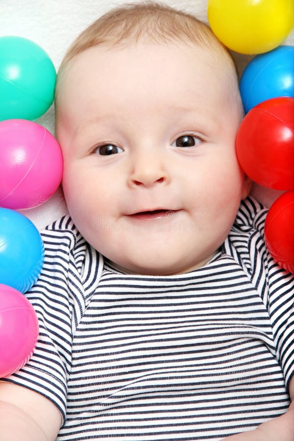 Happy baby with toys stock image. Image of happiness - 30812759