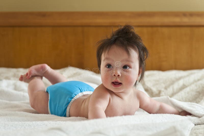 Happy baby on tummy stock photo. Image of girl, cute - 17705256