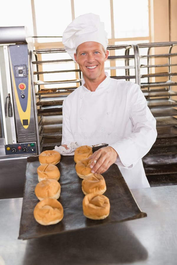 Happy Baker Holding Tray of Fresh Bread Stock Image - Image of happy ...
