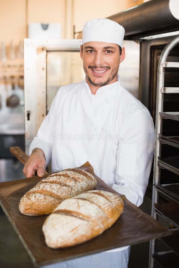 Happy Baker Holding Tray of Fresh Bread Stock Image - Image of chef ...