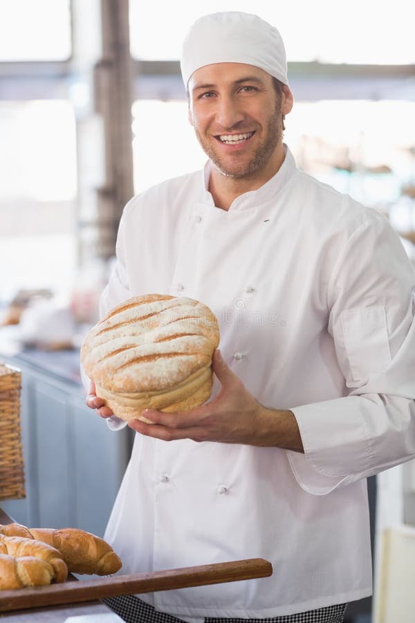 Happy Baker with Loaf of Bread Stock Photo - Image of restaurant, chefs ...
