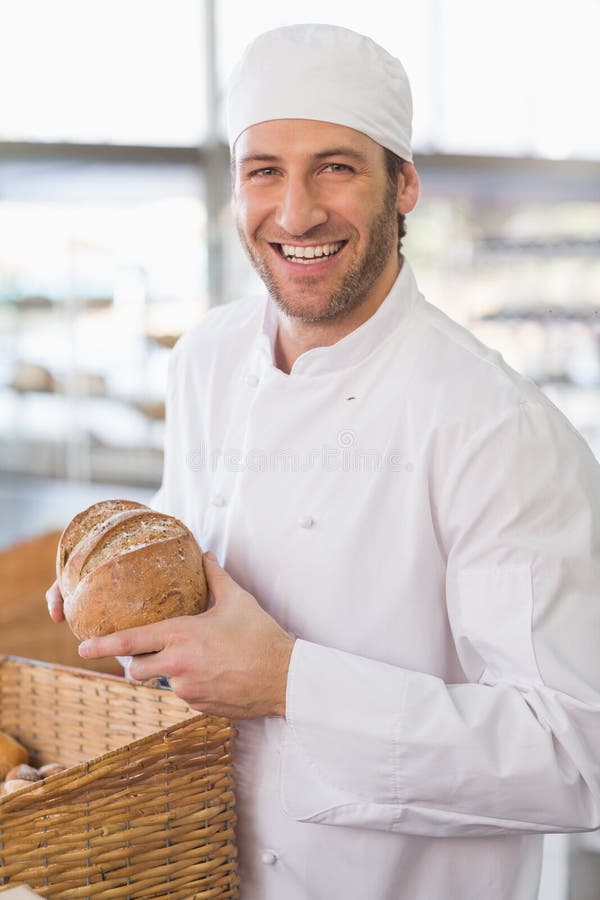 Happy Baker with Loaf of Bread Stock Photo - Image of bakery, roll ...