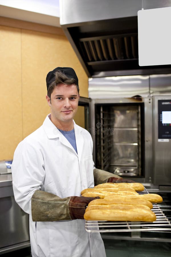 Happy Baker Showing His Baguettes in His Bakery Stock Image - Image of ...