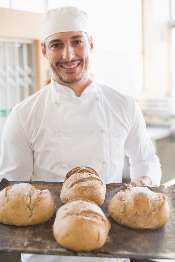 Happy Baker Showing Tray of Fresh Bread Stock Photo - Image of bread ...