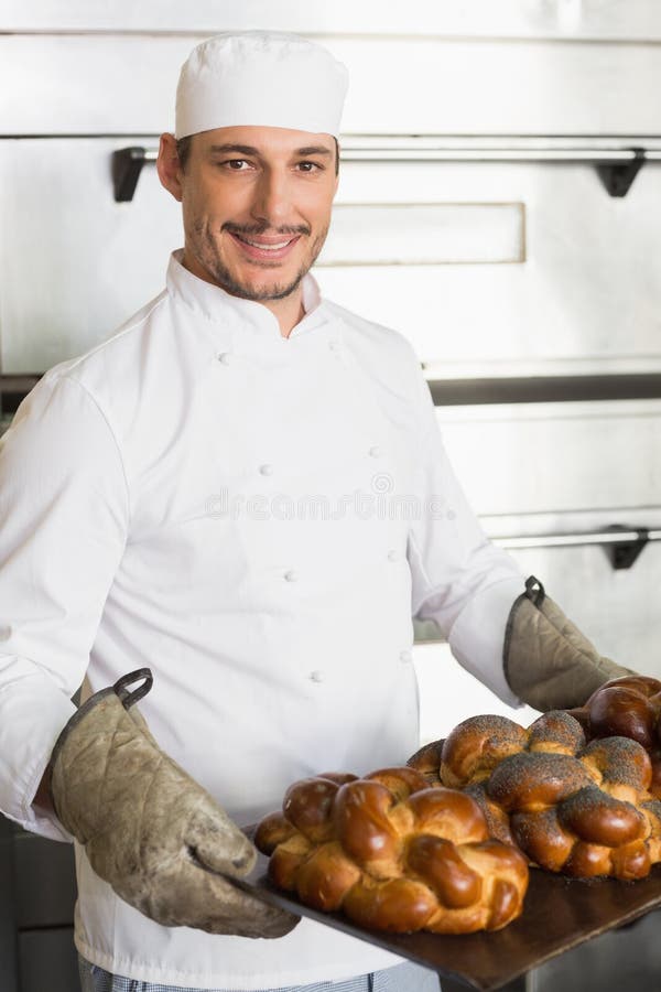 Happy Baker Showing Tray of Fresh Bread Stock Photo - Image of business ...