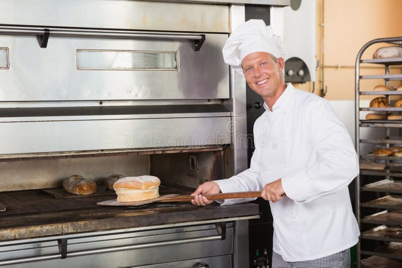Happy Baker Taking Out Fresh Loaf Stock Photo - Image of fresh ...