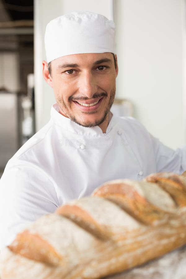 Happy Baker Taking Out Fresh Loaf Stock Photo - Image of portrait ...