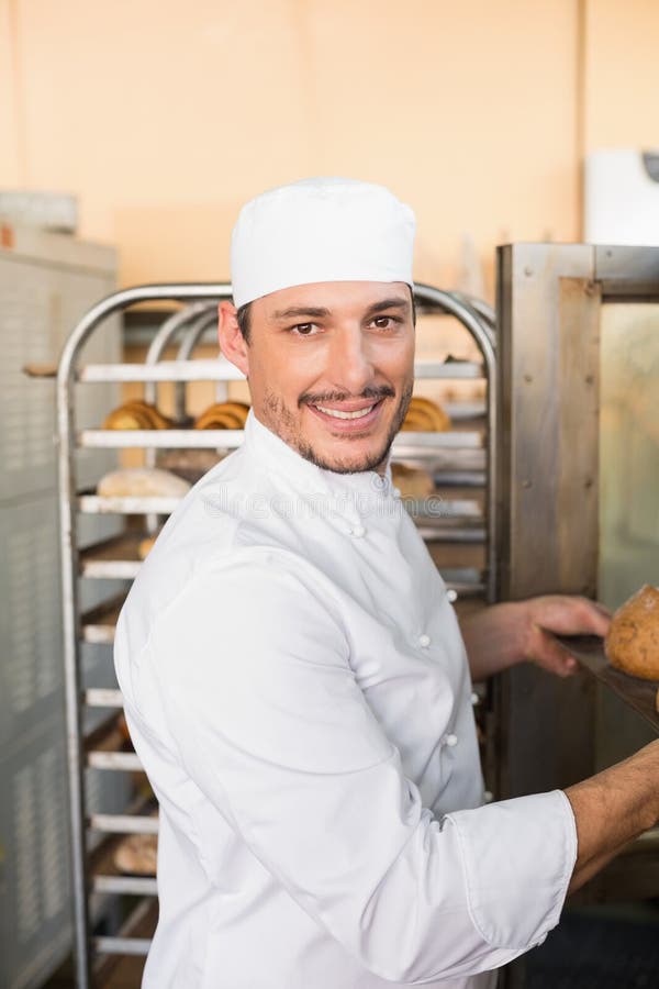 Happy Baker Taking Out Fresh Loaves Stock Image - Image of baker, hotel ...