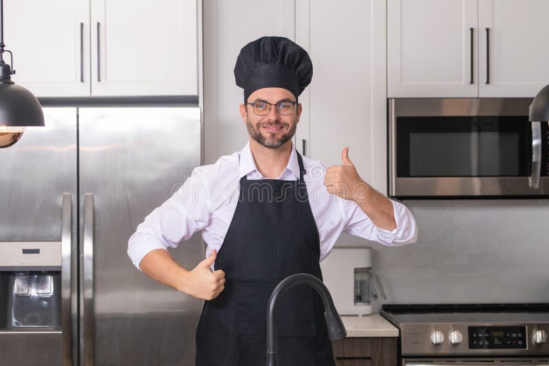 Happy Baker with Thumb Up. Man in Chef Apron Cooking on Kitchen. Stock ...