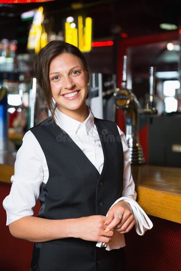 Happy Barmaid Smiling at Camera Stock Image - Image of bartender, front ...