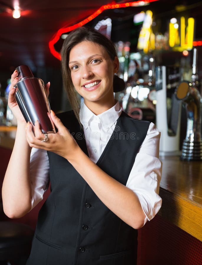 Happy Barmaid Smiling at Camera Making Cocktail Stock Photo - Image of ...