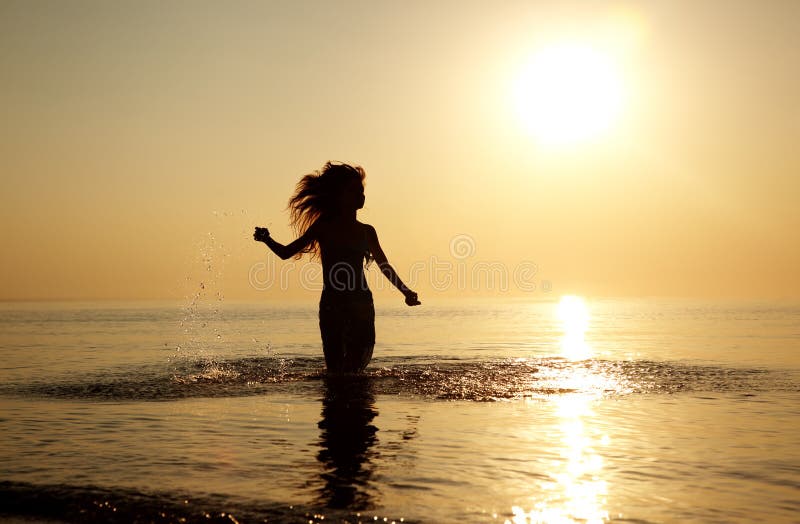 Happy at the beach stock photo. Image of resort, hair - 16556318