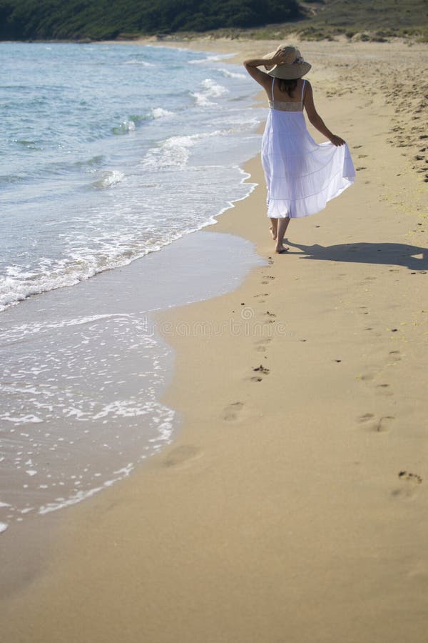 Happy beach stroll stock photo. Image of beauty, beautiful - 27388988