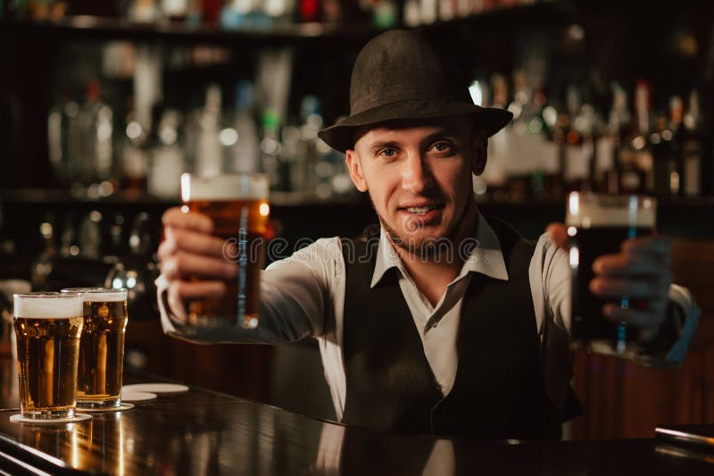Happy Bearded Bartender at Bar Counter with Glasses of Beer Stock Image ...