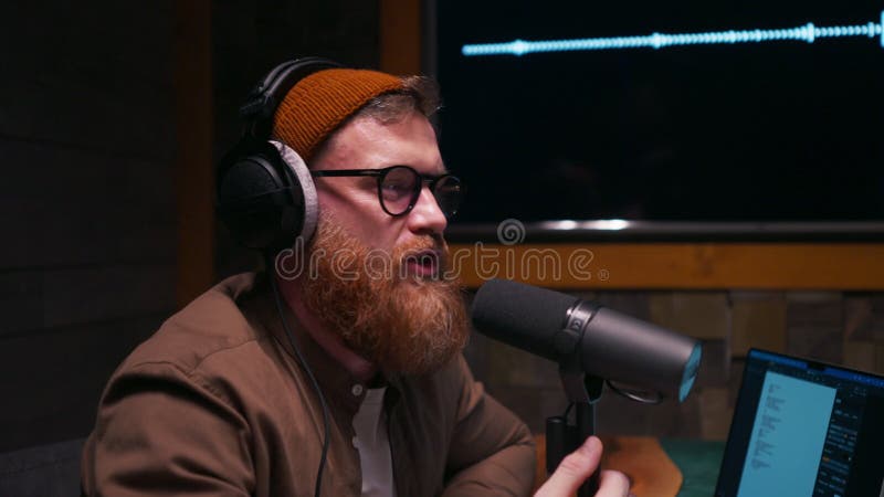 Happy Bearded Presenter Interviewing Guest in Recording Studio Stock ...