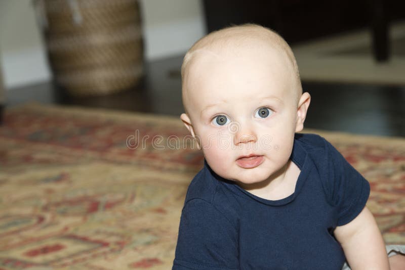 A Happy Beautiful Baby Boy Looks at the Camera Stock Photo - Image of ...