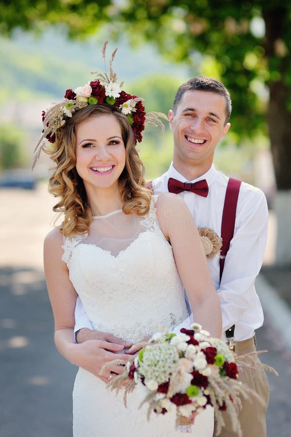 Happy Beautiful Bride and Groom Walking in Sunlight Stock Photo - Image ...