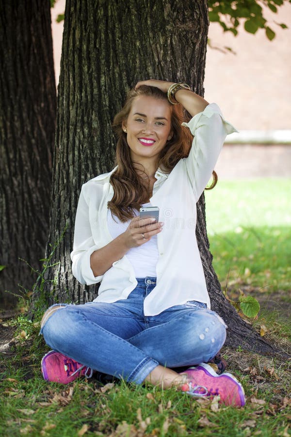 Happy Beautiful Girl Calling by Phone Stock Image - Image of park ...