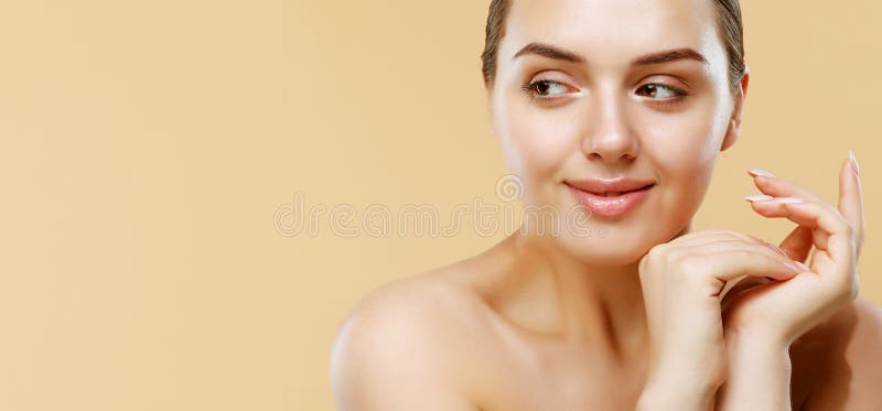 Happy Beautiful Woman Holding Her Cheeks A Laugh Looking To The Side