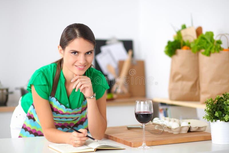 Happy Beautiful Woman Standing in Her Kitchen Stock Photo - Image of ...