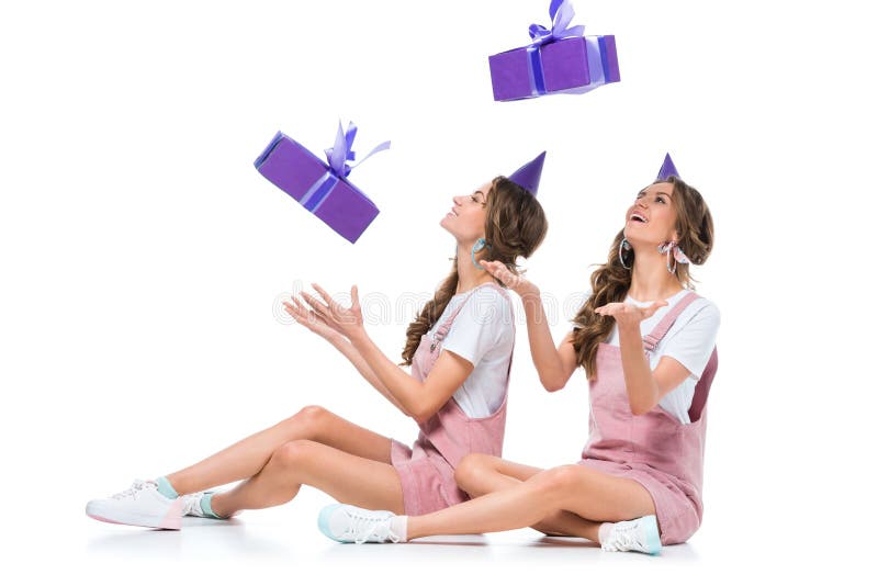 Happy Beautiful Young Twins Catching Falling Present Boxes Stock Image ...