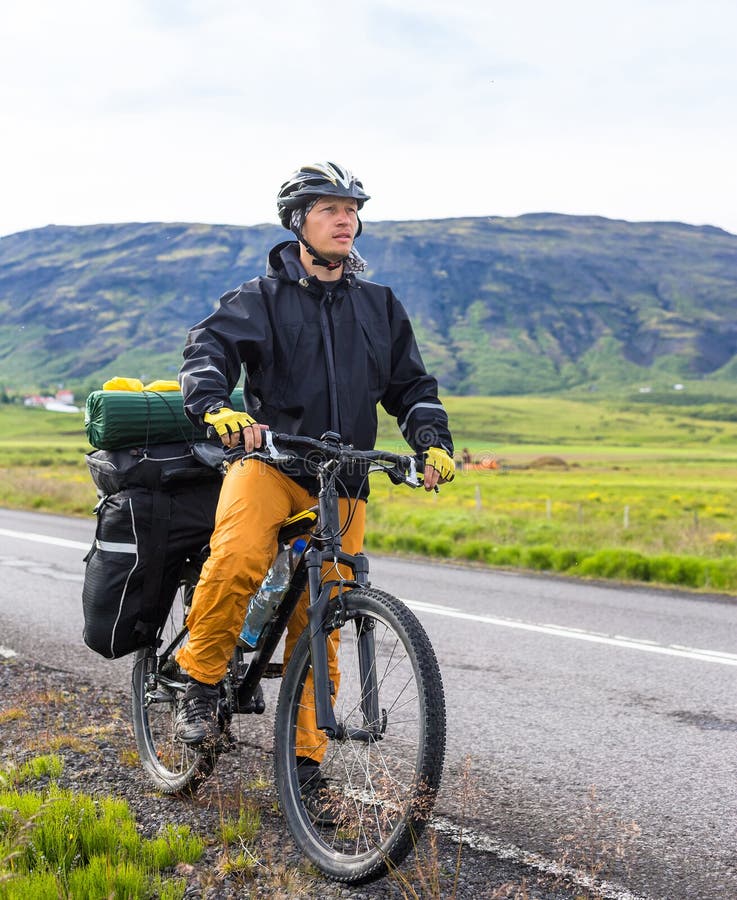 Happy Biker on Backdrop of Mountains in Iceland Stock Image - Image of ...