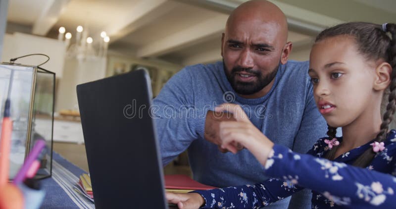 Happy Biracial Father and Daughter Learning Online Using Laptop at ...