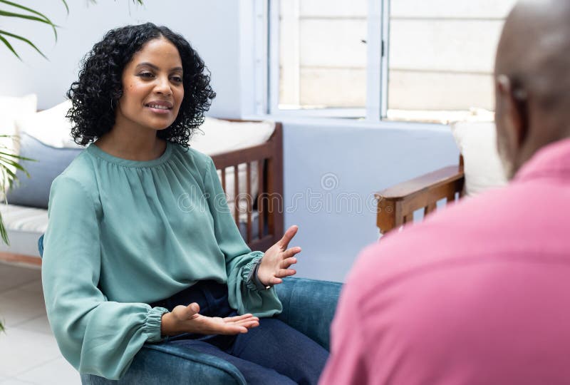 Happy African American Male Patient Attending Therapy with Biracial ... Happy African American Male Patient Attending Therapy with Biracial ...