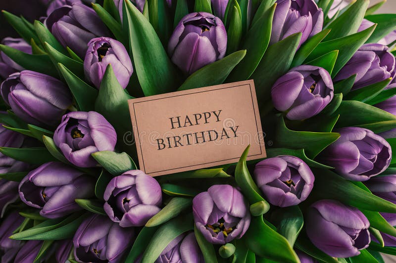 Happy Birthday Text on Label in Front of Purple Tulips. Stock Image ...