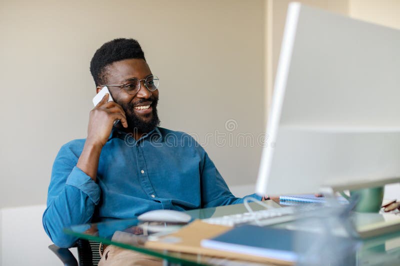 Happy Black Businessman Having Phone Conversation with Client, Sitting ...