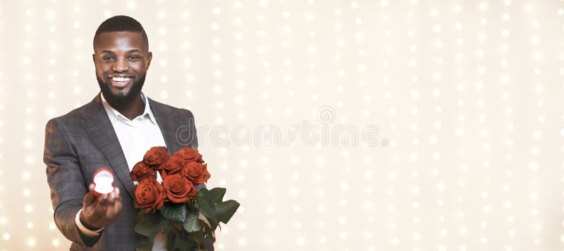 Happy Black Guy Holding Red Roses and Wedding Ring Stock Image - Image ...