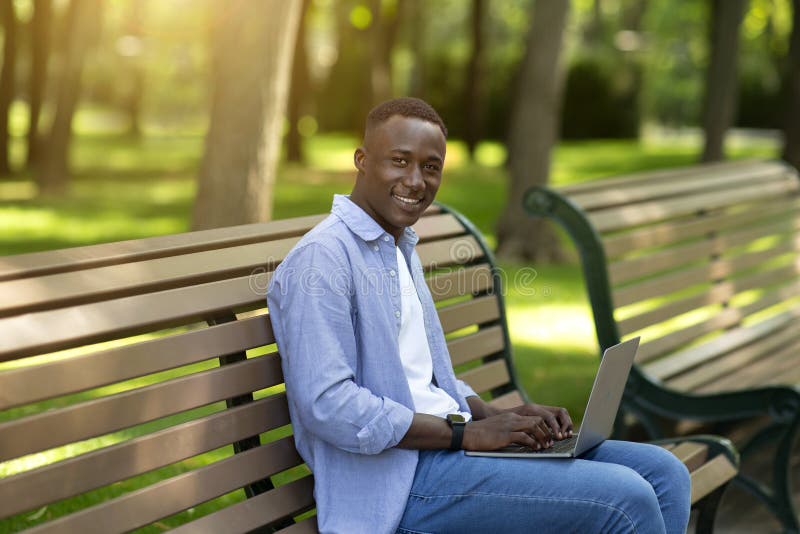 Happy Black Guy with Laptop Computer Working or Studying Online on ...