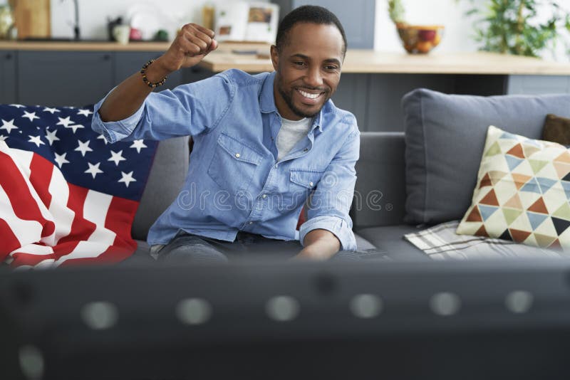Black Man Cheering in Front of TV Stock Photo - Image of euphoria ...