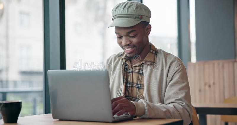 Happy Black Man Typing on Laptop in Coffee Shop, Remote Work and ...