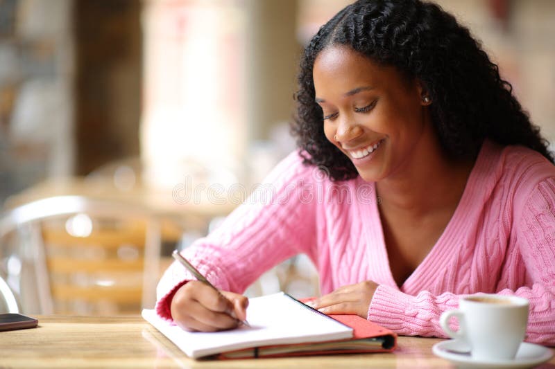 Happy Black Student Taking Notes Studying in a Bar Stock Image - Image ...