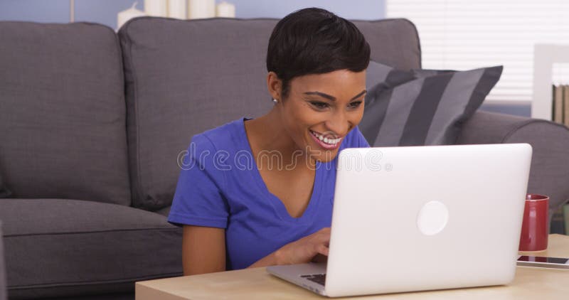 Happy Black Woman Surfing the Internet Stock Photo - Image of indoors ...