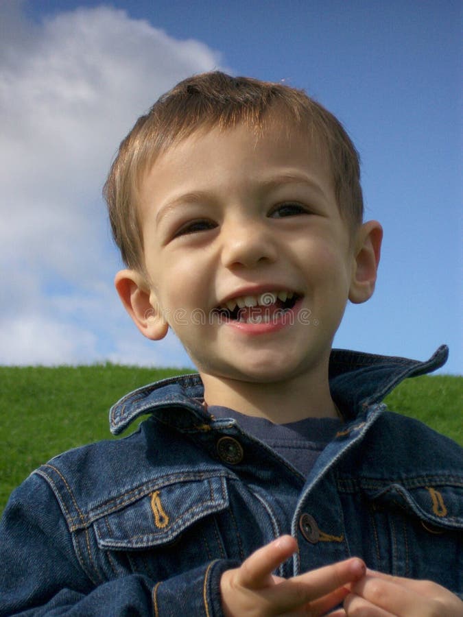 Happy boy stock image. Image of smiling, brown, jeans, happy - 102877