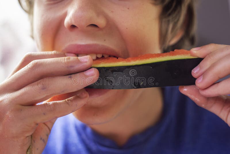 Happy Boy Bites Off a Piece of Red Watermelon. Stock Photo - Image of ...