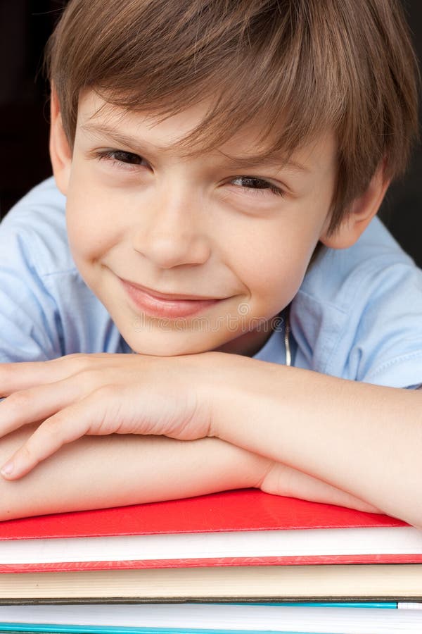 Happy boy with books stock photo. Image of youth, young - 21588530