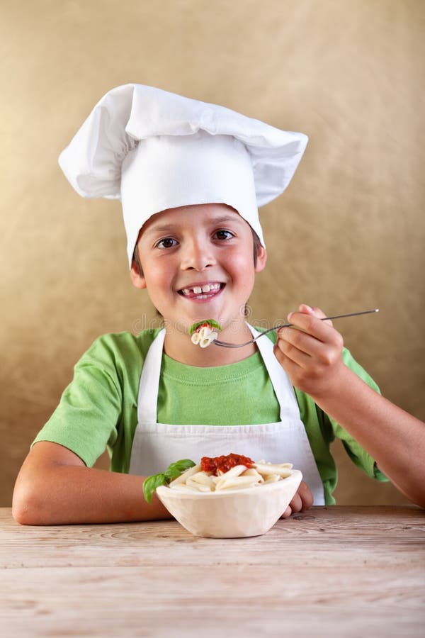 Happy Boy with Chef Hat Eating Pasta Stock Image - Image of appetite ...