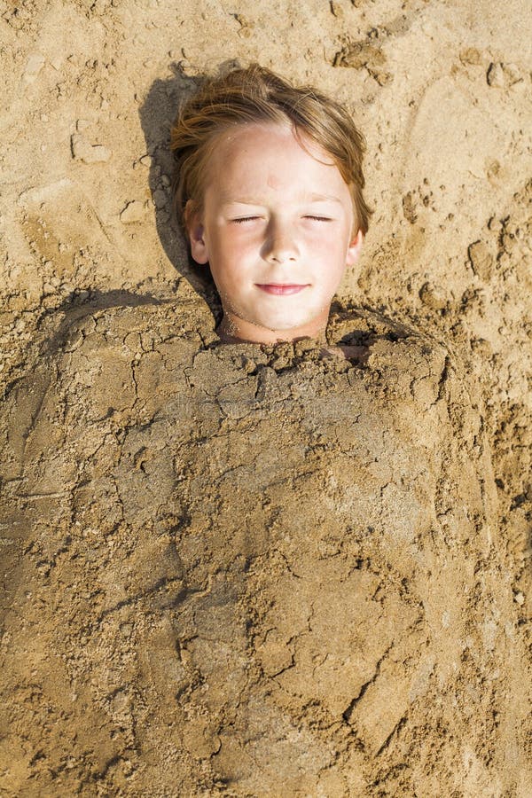 Happy Boy Dig Oneself in the Sand Stock Image - Image of enjoying ...