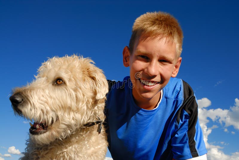 Happy boy with dog stock photo. Image of adorable, excitement - 3649002