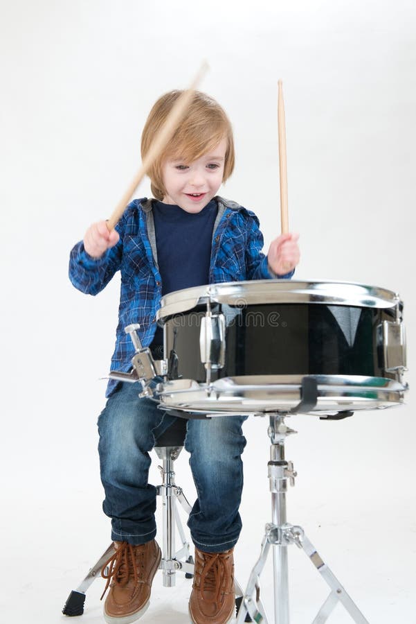 Happy boy with drum stock photo. Image of little, playing - 53694730