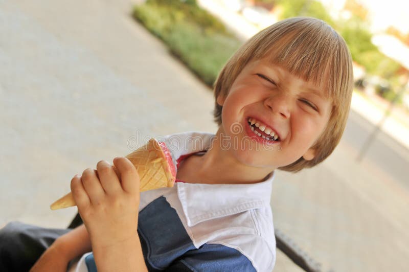 Happy boy eating ice-cream stock image. Image of childhood - 29389683