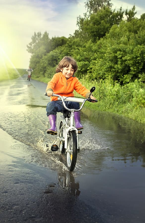 Happy Boy Going Puddle Stock Photos - Free & Royalty-Free Stock Photos ...