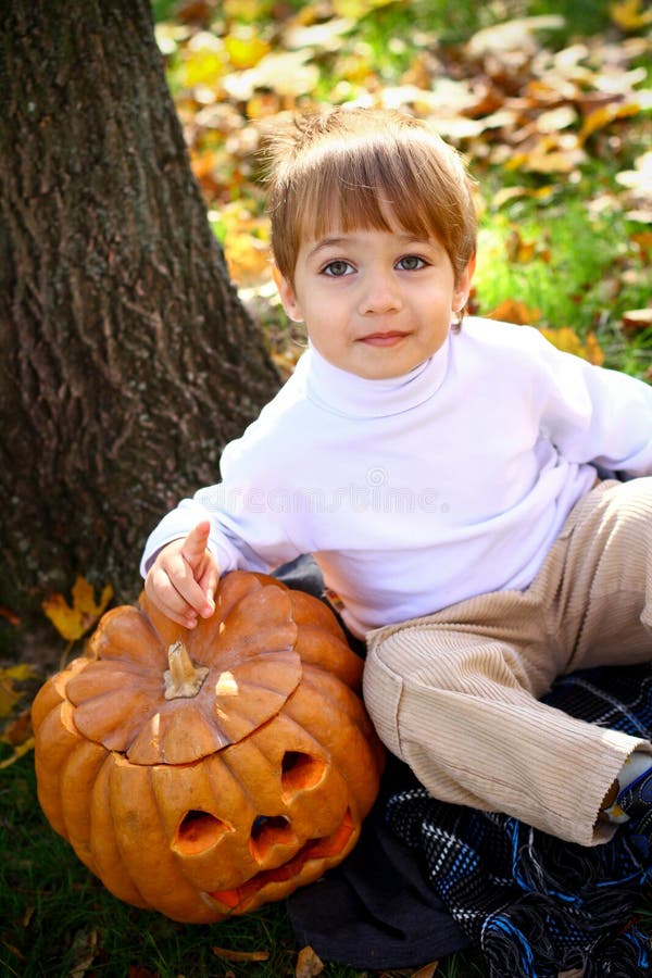 Happy Boy with Halloween Pumpkin Stock Image - Image of head, cute ...