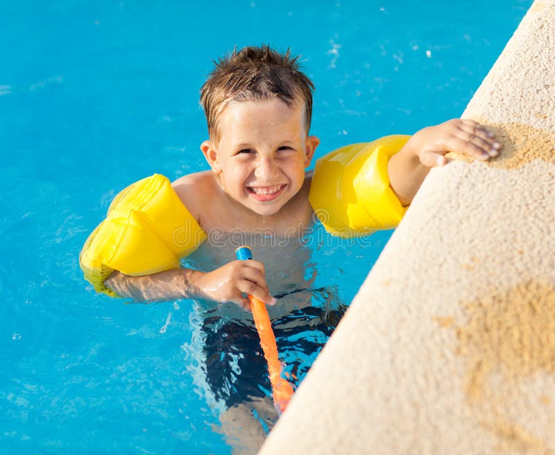 Happy Boy Having a Fun at Swimming Pool Stock Photo - Image of splash ...