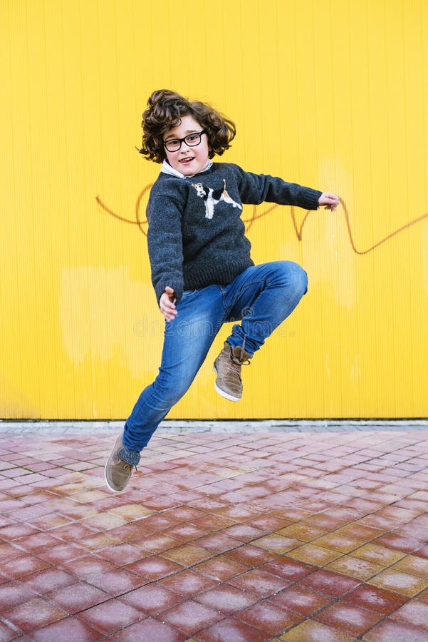 Happy boy jumping. stock image. Image of urban, jumping - 90091751