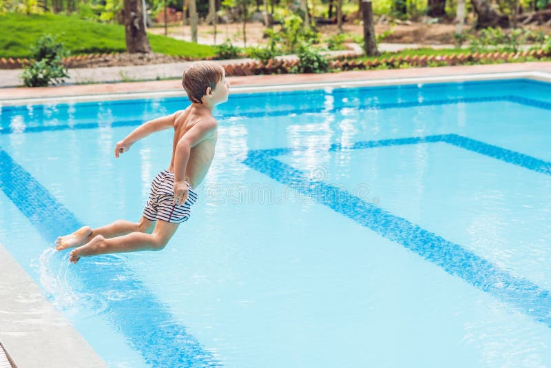 Happy Boy Kid Jumping in the Pool Stock Image - Image of lifestyle ...
