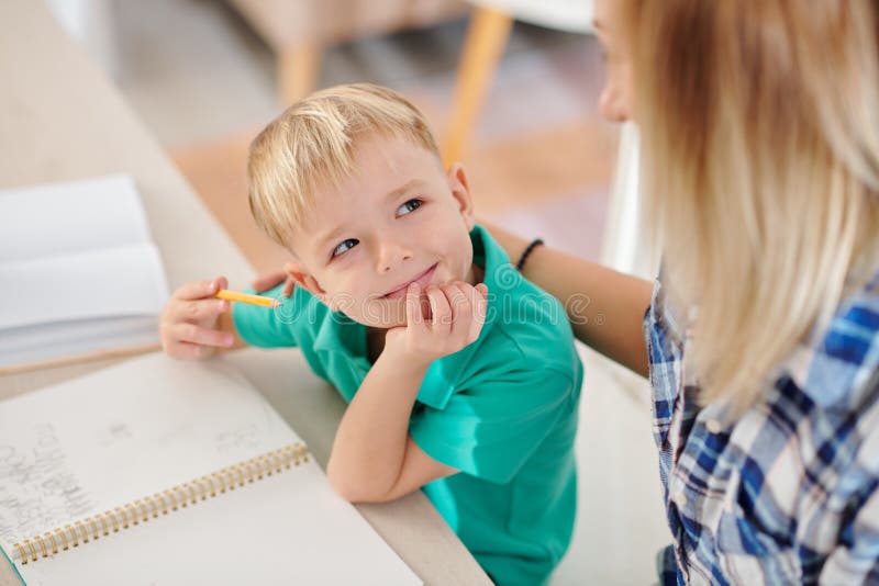 Happy Boy Looking at Mother Stock Photo - Image of quarantine, parent ...
